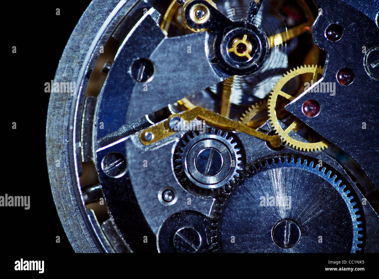 Clockwork macro isolated over the black background Stock Photo - Alamy