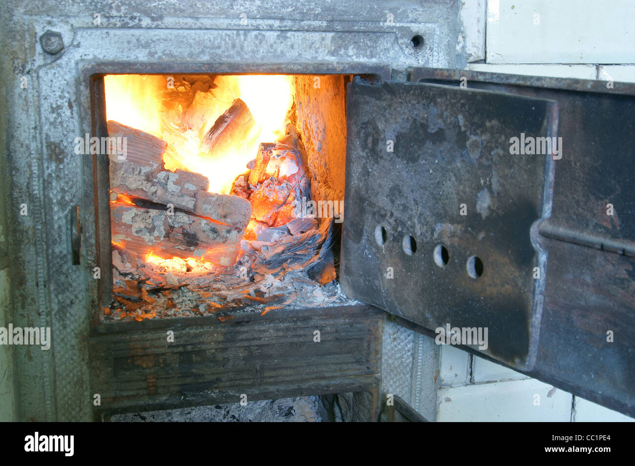 Old fireplace and door, stove, fire Stock Photo - Alamy