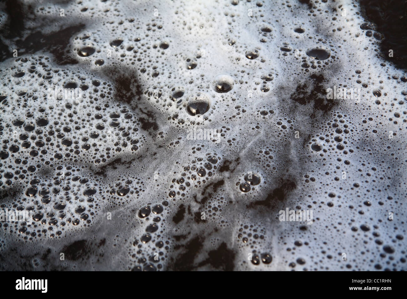 spume on water Stock Photo - Alamy