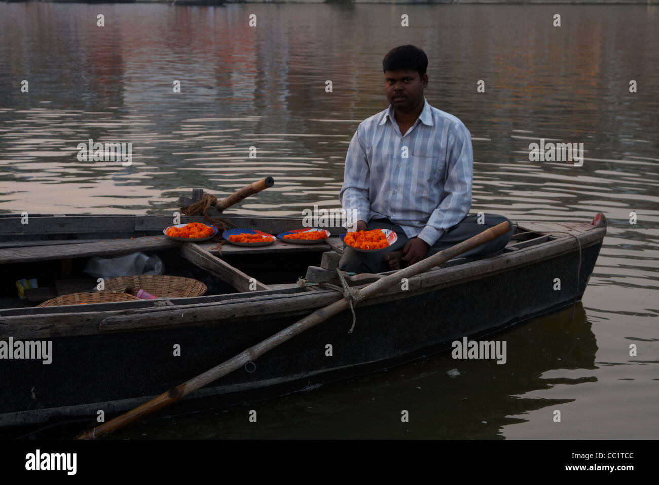 Butter/oil lamp diya seller, Ganges River, Varanasi, India Stock Photo ...