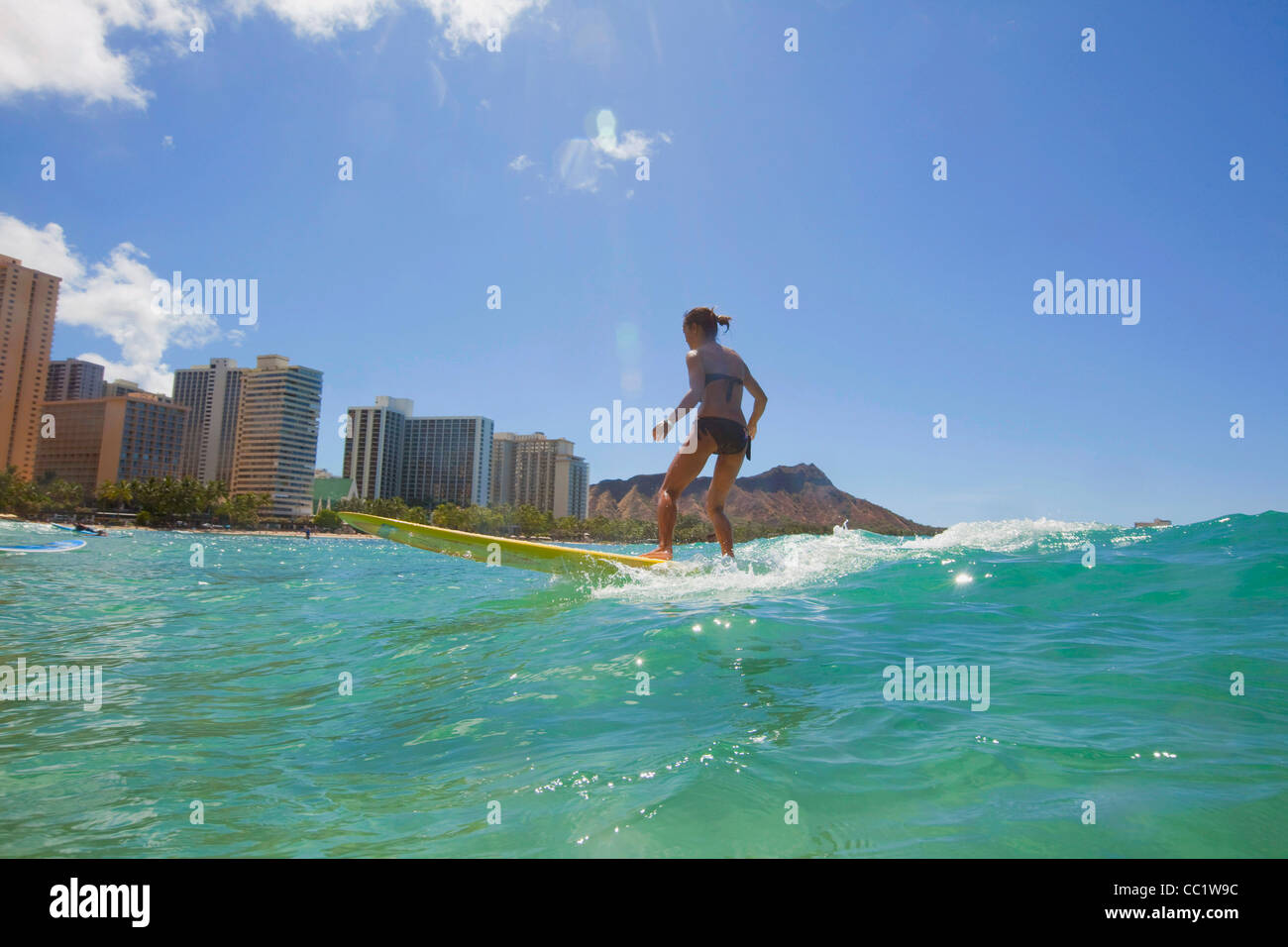 Waikiki beach woman surfer hi-res stock photography and images - Alamy