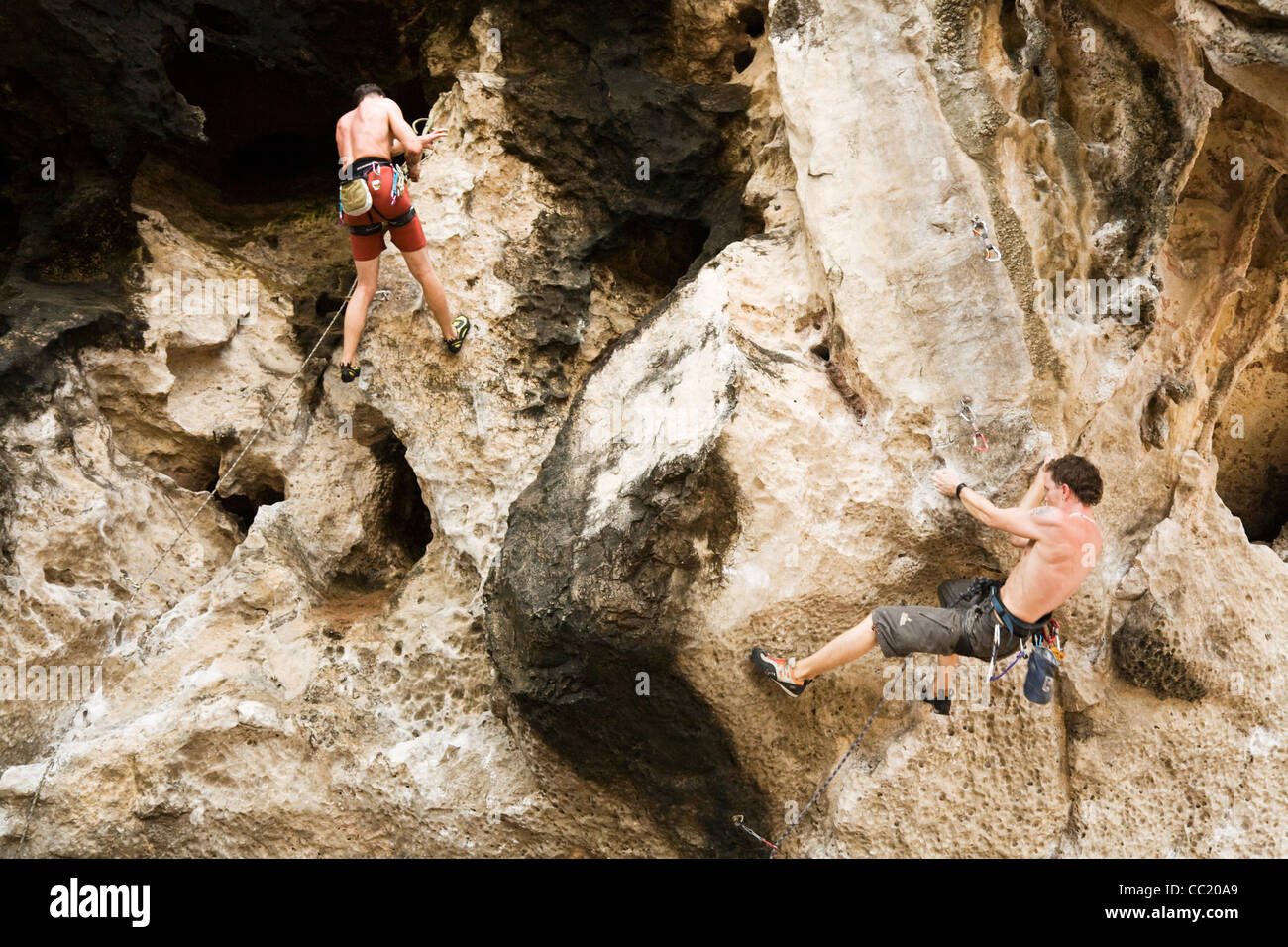 Rock climbers scaling limestone cliffs at Railay, Krabi, Thailand Stock ...
