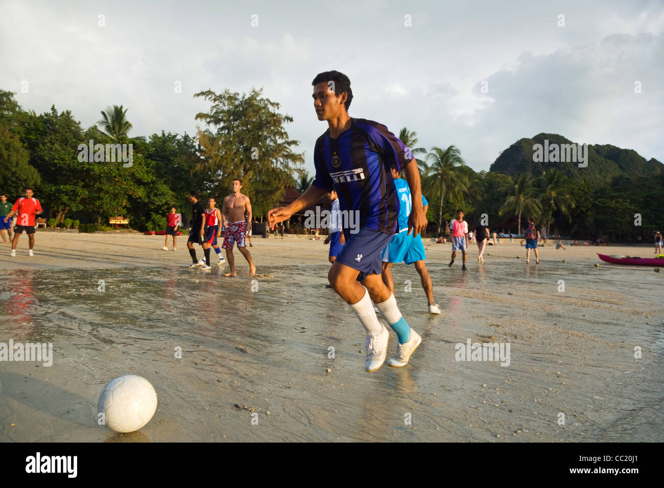 Locals playing beach football at West Railay Beach (Hat Rai Leh West ...