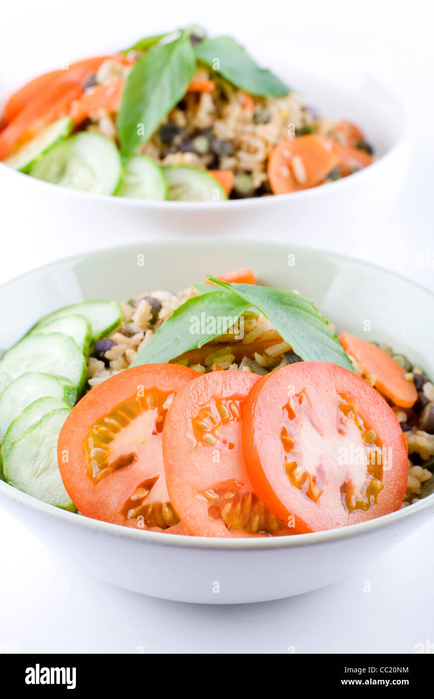 Delicious Asian Vegetable Fried Rice, containing tomato, cucumber ...