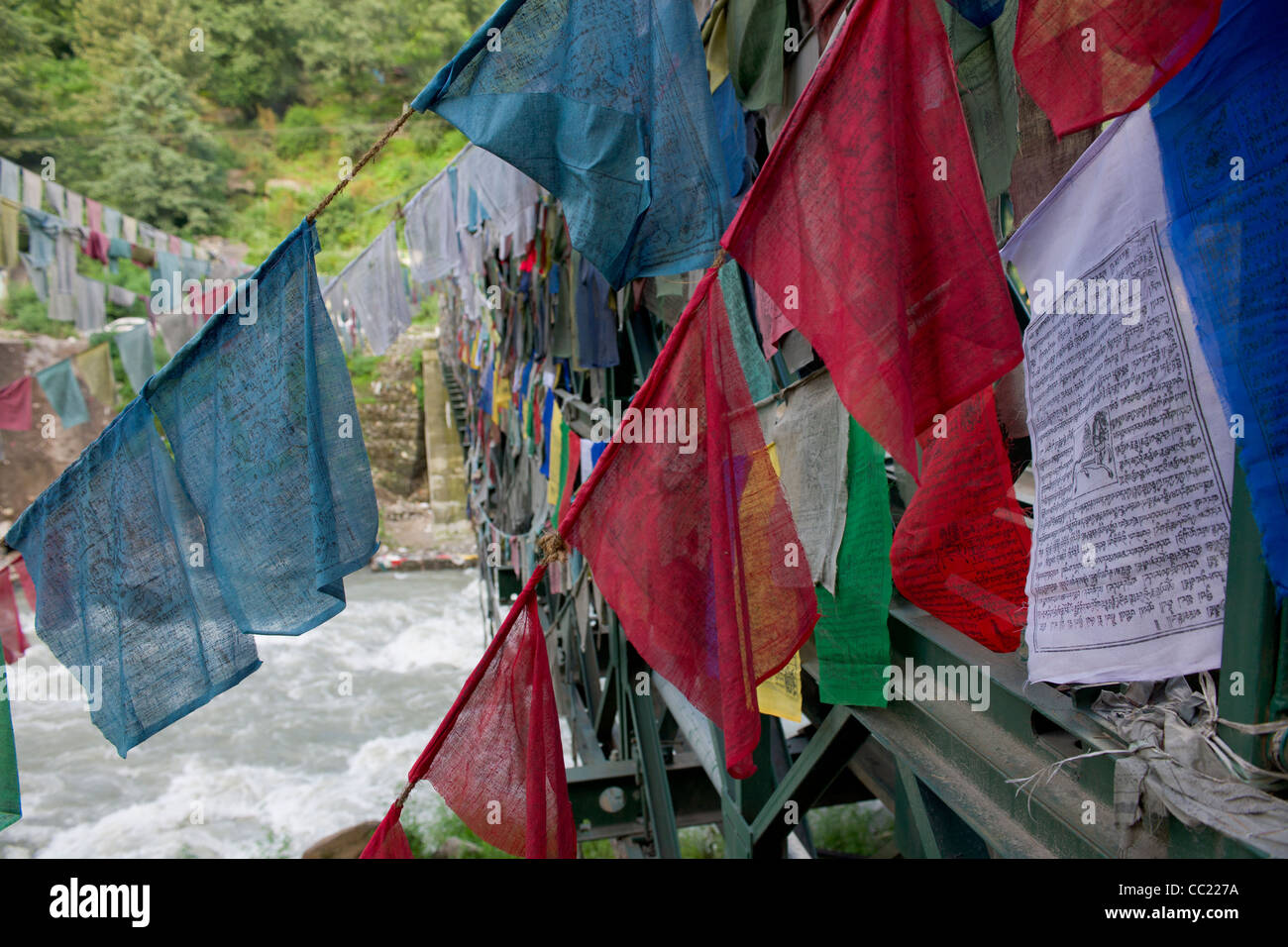 Buddhist prayer flags on a bridge over Beas River, Manali, Himachal ...