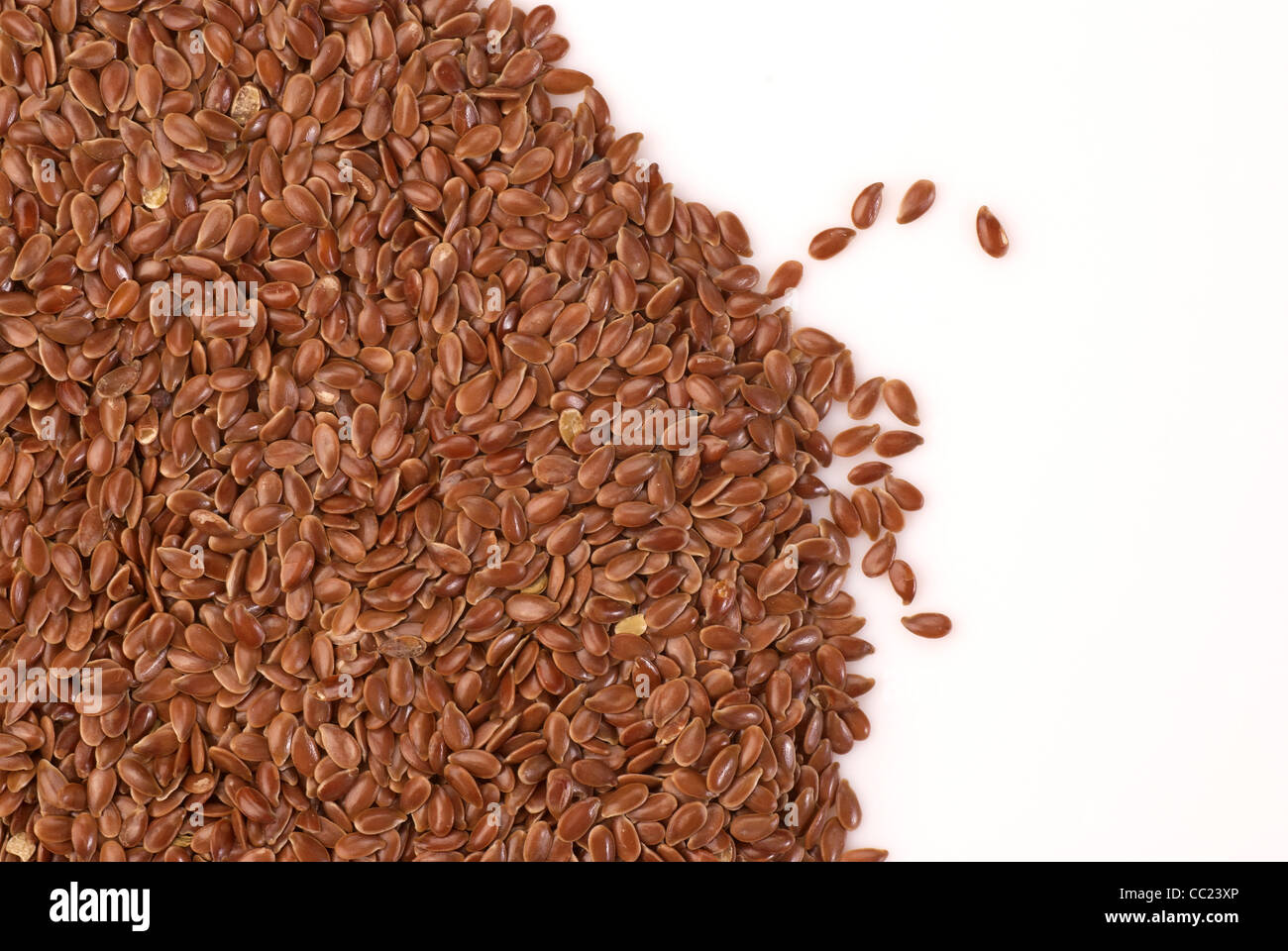 Organic linseed isolated on white with copy space Stock Photo - Alamy