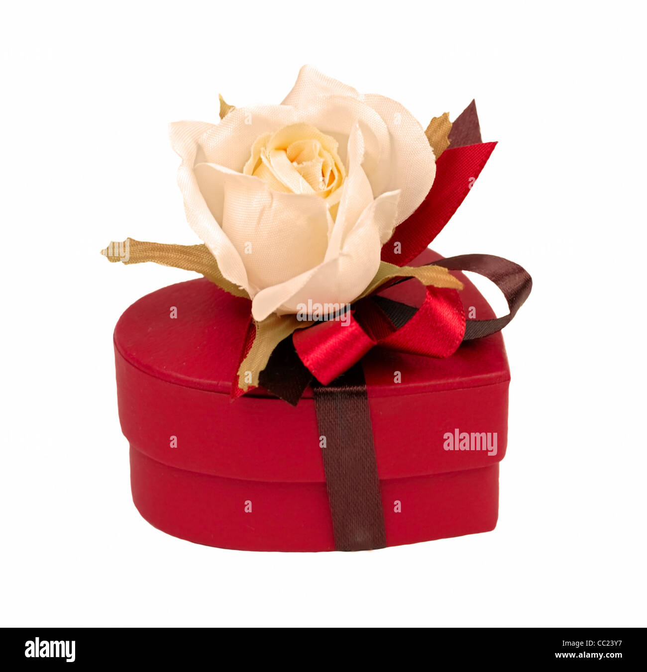 Heart shape red chocolate box with a rose isolated over white ...