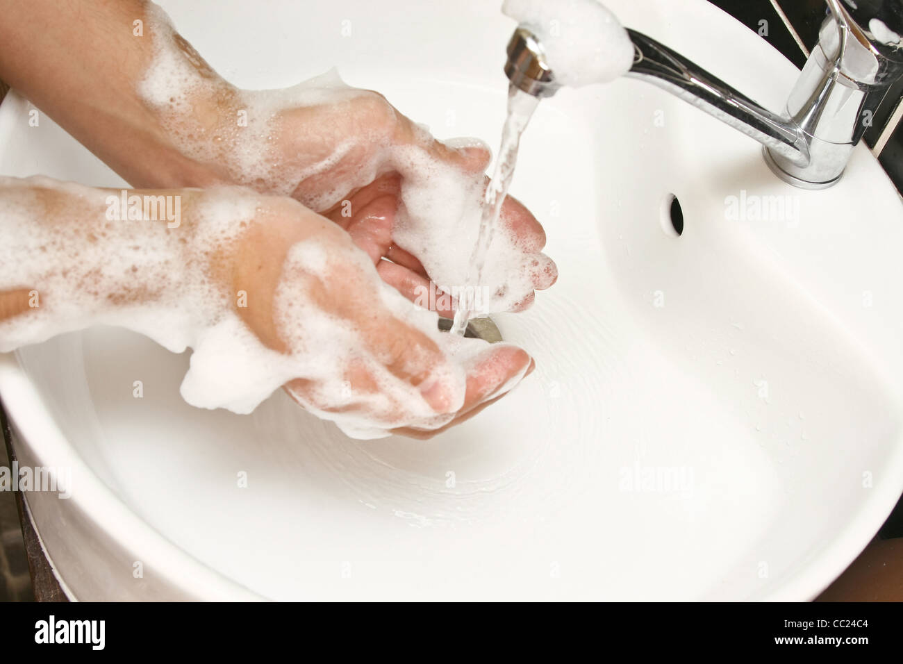 close-up of washing hands with water and soap Stock Photo - Alamy