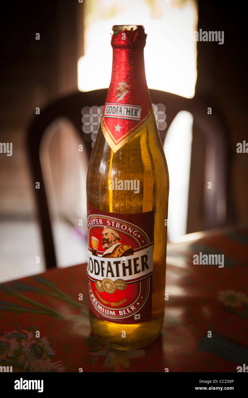 India, Arunachal Pradesh, open bottle of Godfather super strong premium ...