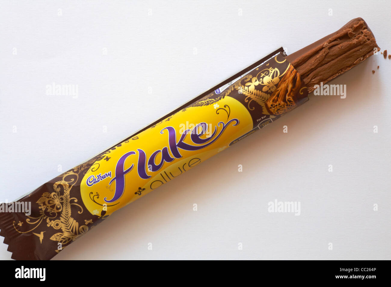 Cadbury Flake Allure chocolate opened to show contents on white ...