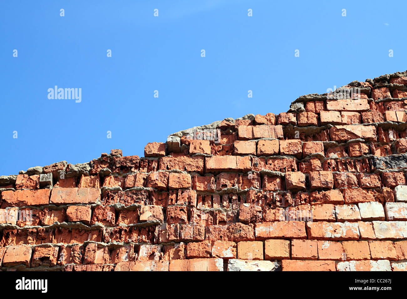 aging brick wall on celestial background Stock Photo - Alamy