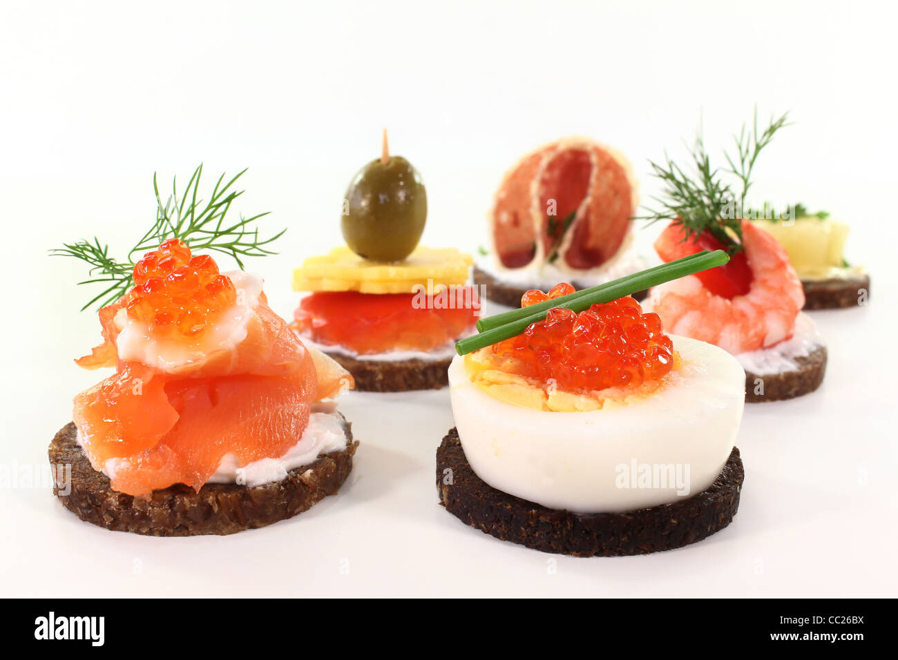different canapés on a white background Stock Photo - Alamy