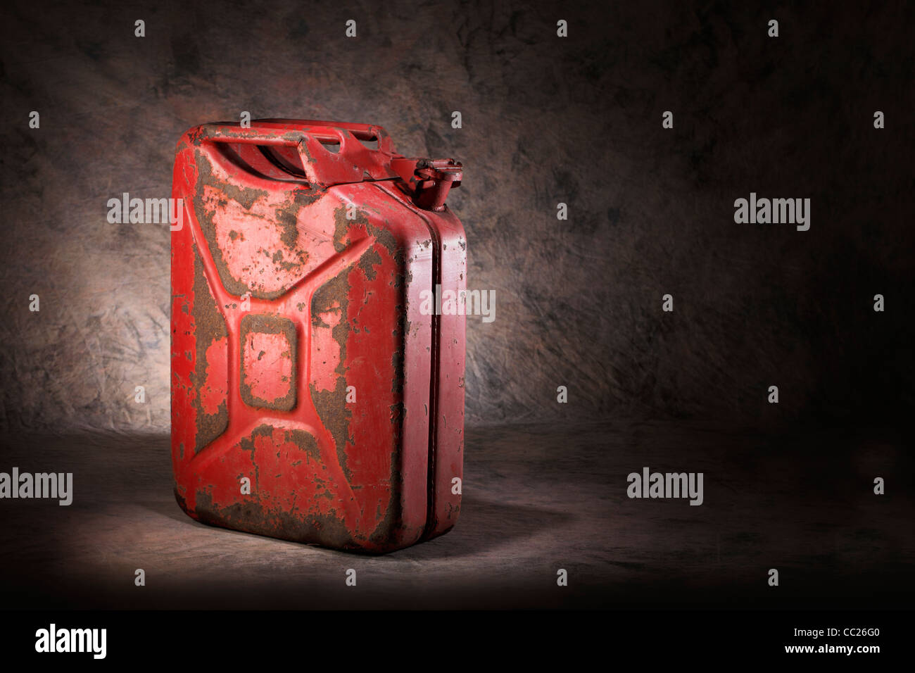 Old, dirty and rusty red jerry can fuel container Stock Photo - Alamy