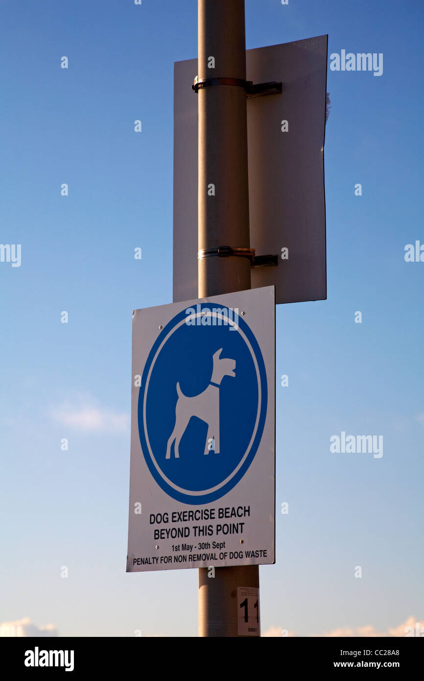 Dog exercise beach beyond this point sign on Bournemouth beach in ...