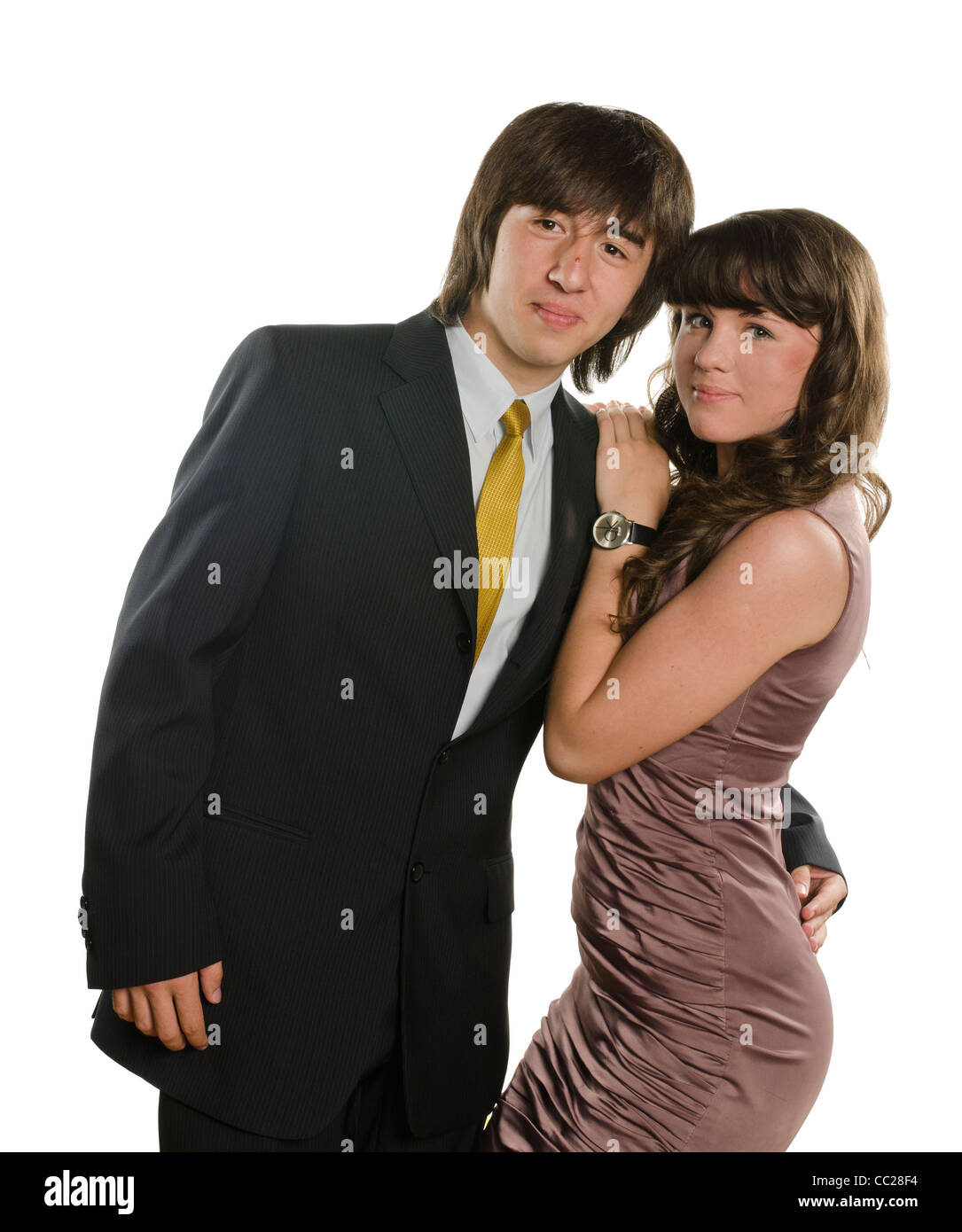 Two elementary school graduates posing on white background Stock Photo ...