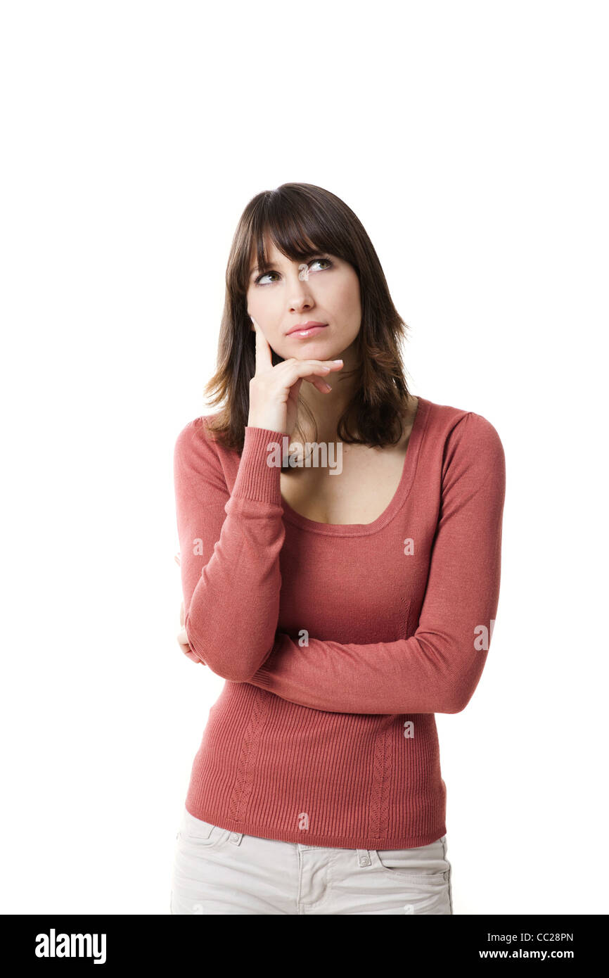 Portrait of a beautiful woman thinking. Studio shot, isolated on a ...