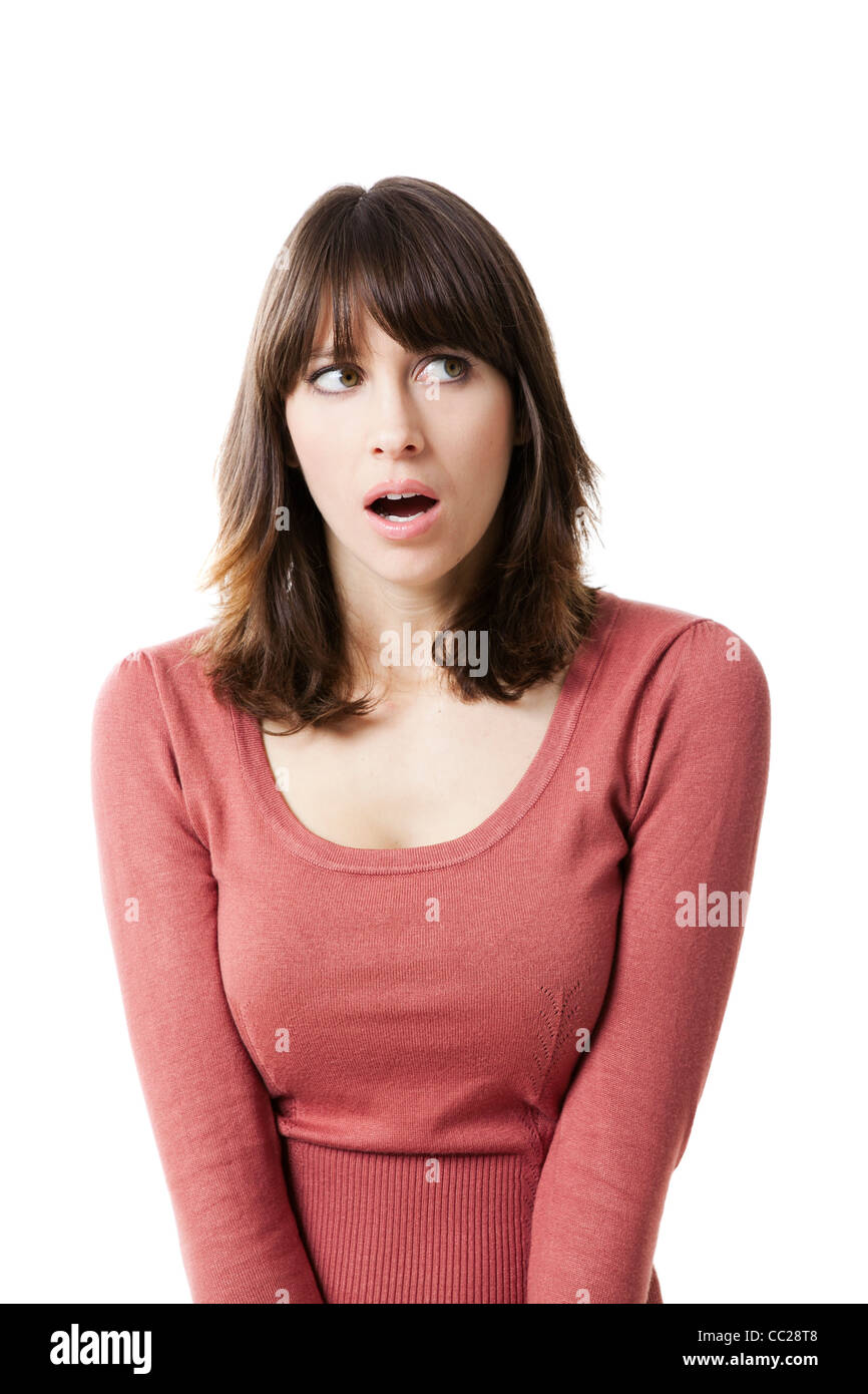 Beautiful woman looking confused. Studio shot with isolated white ...