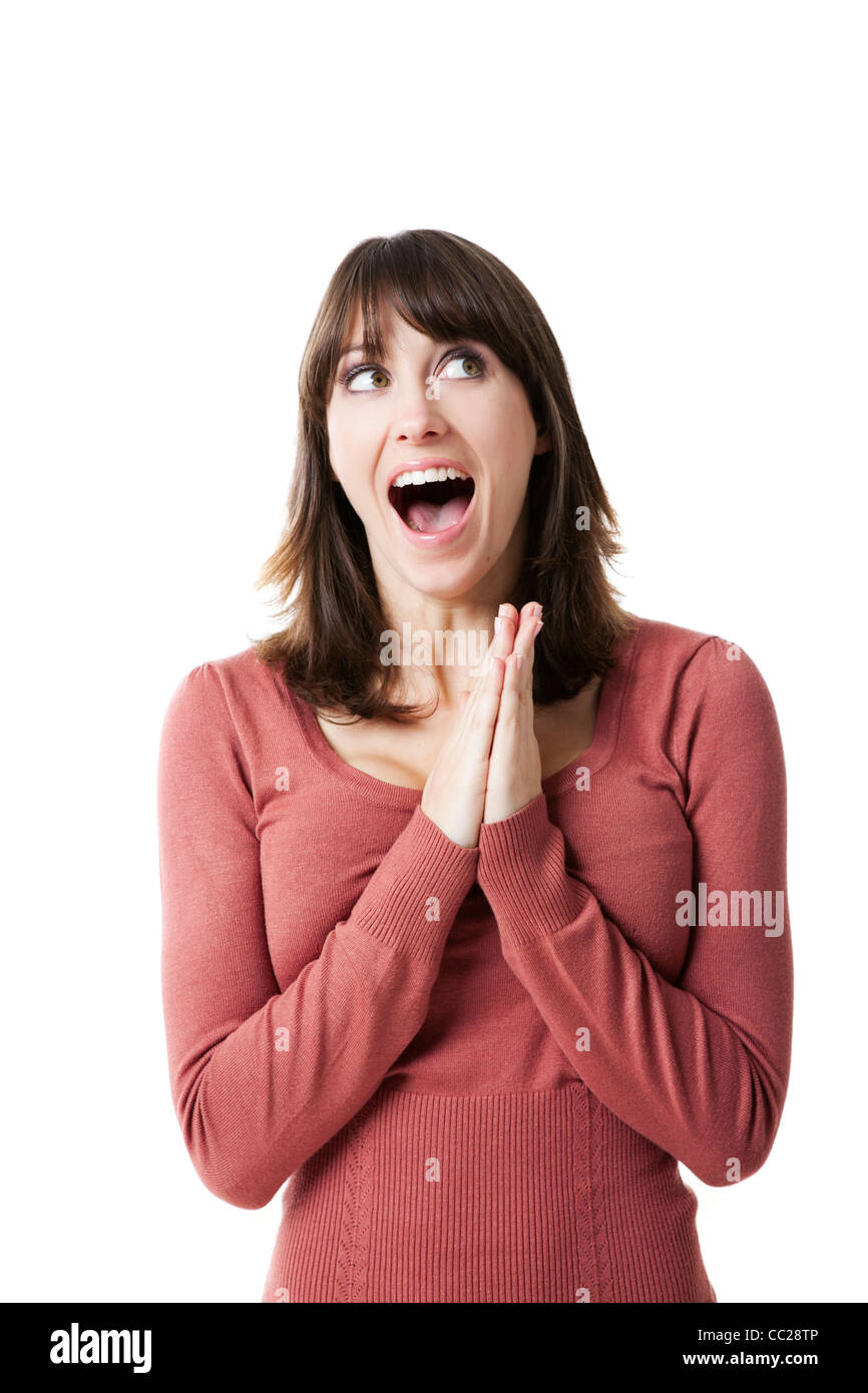 Portrait of a beautiful woman looking surprised and smiling, isolated ...