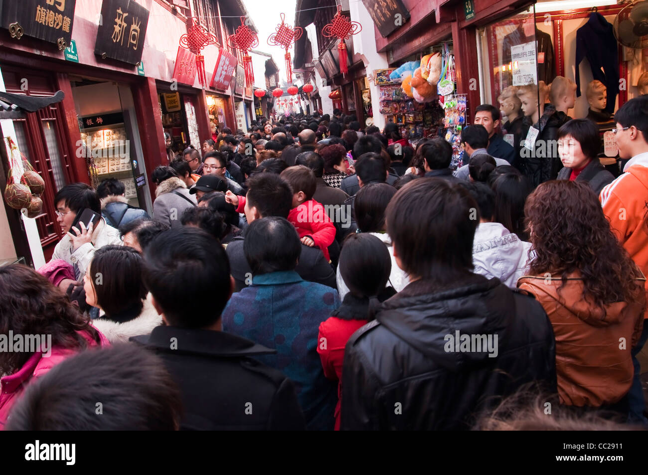 Crowd in a street of Qibao ancient town, in Shanghai during Chinese New ...