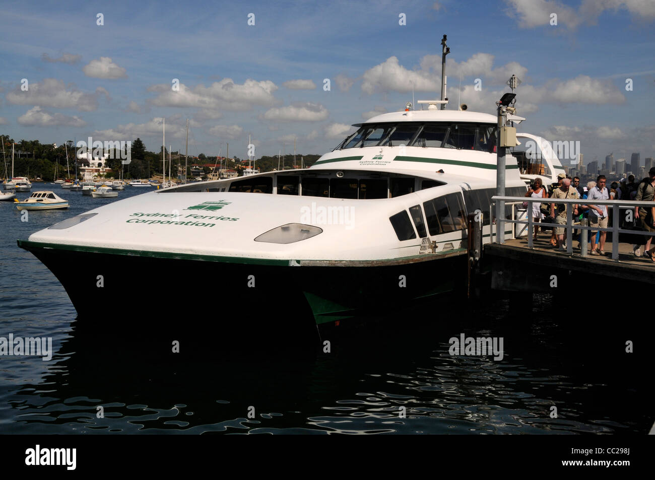 Foot passengers disembark a high-speed commuter ferry of the Sydney ...