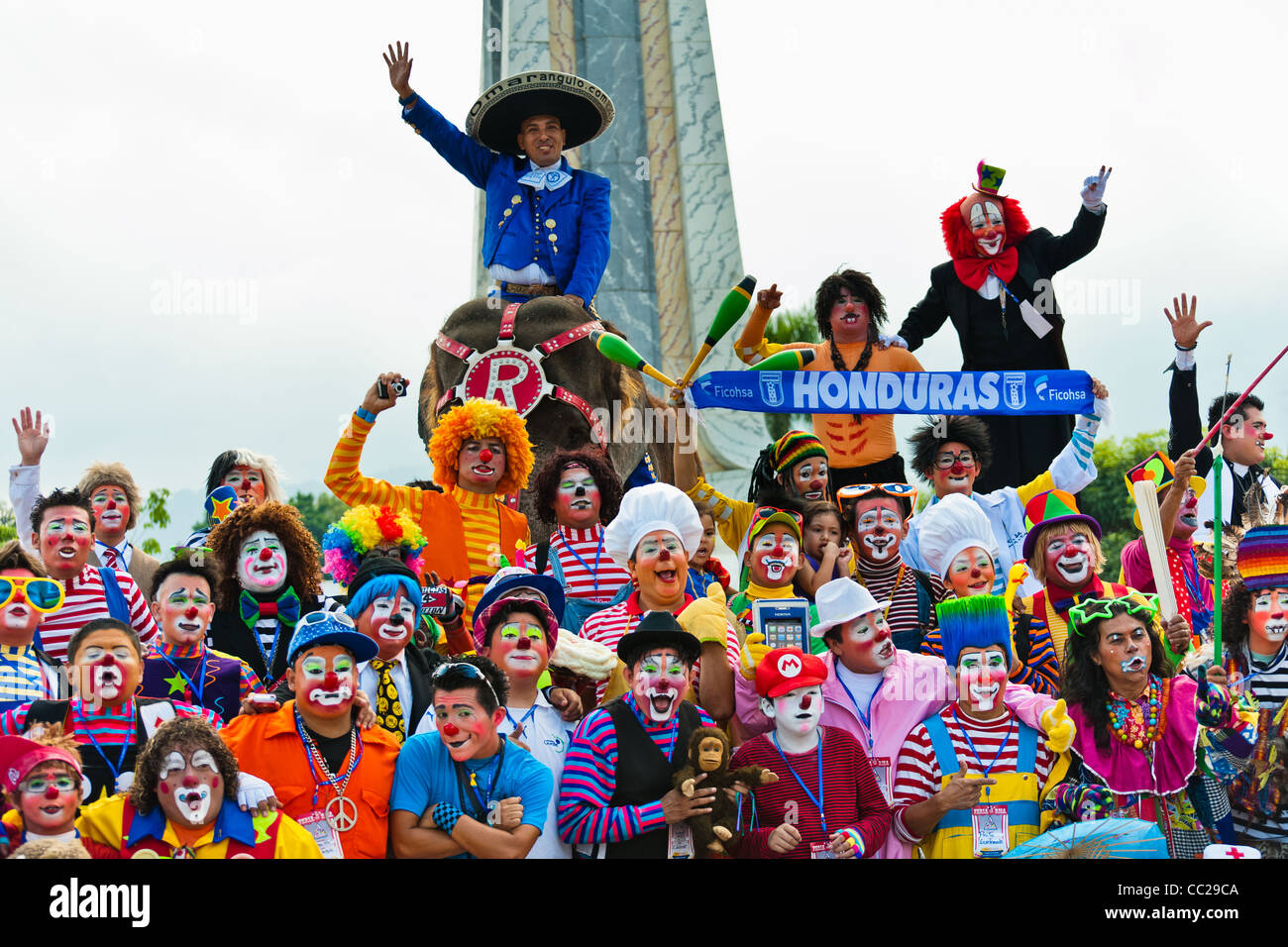 Clowns, participants of the Clown Congress, pose for a group picture on ...
