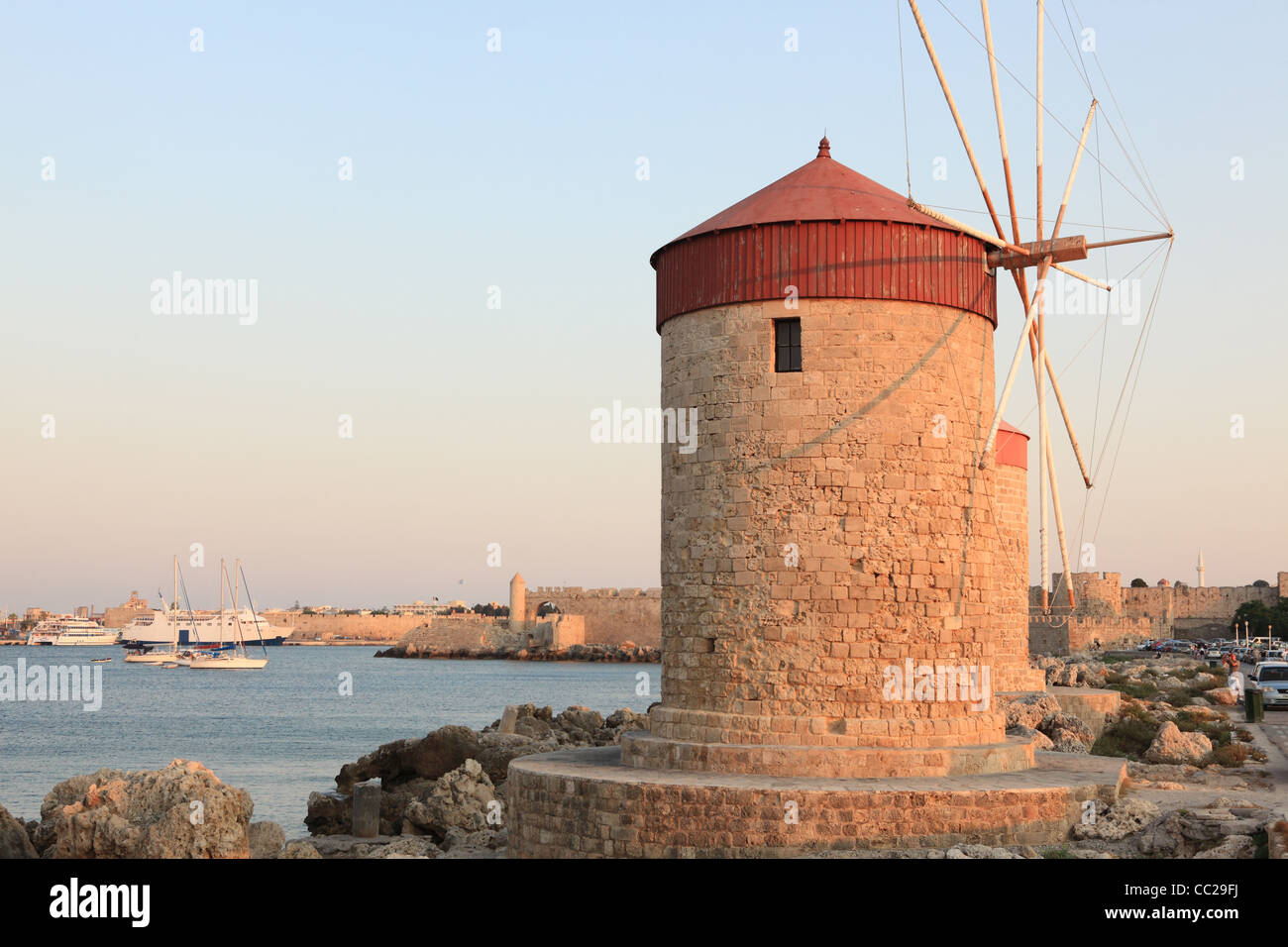 The famous windmills in the Port of Rhodes, on Rhodes island, in the ...