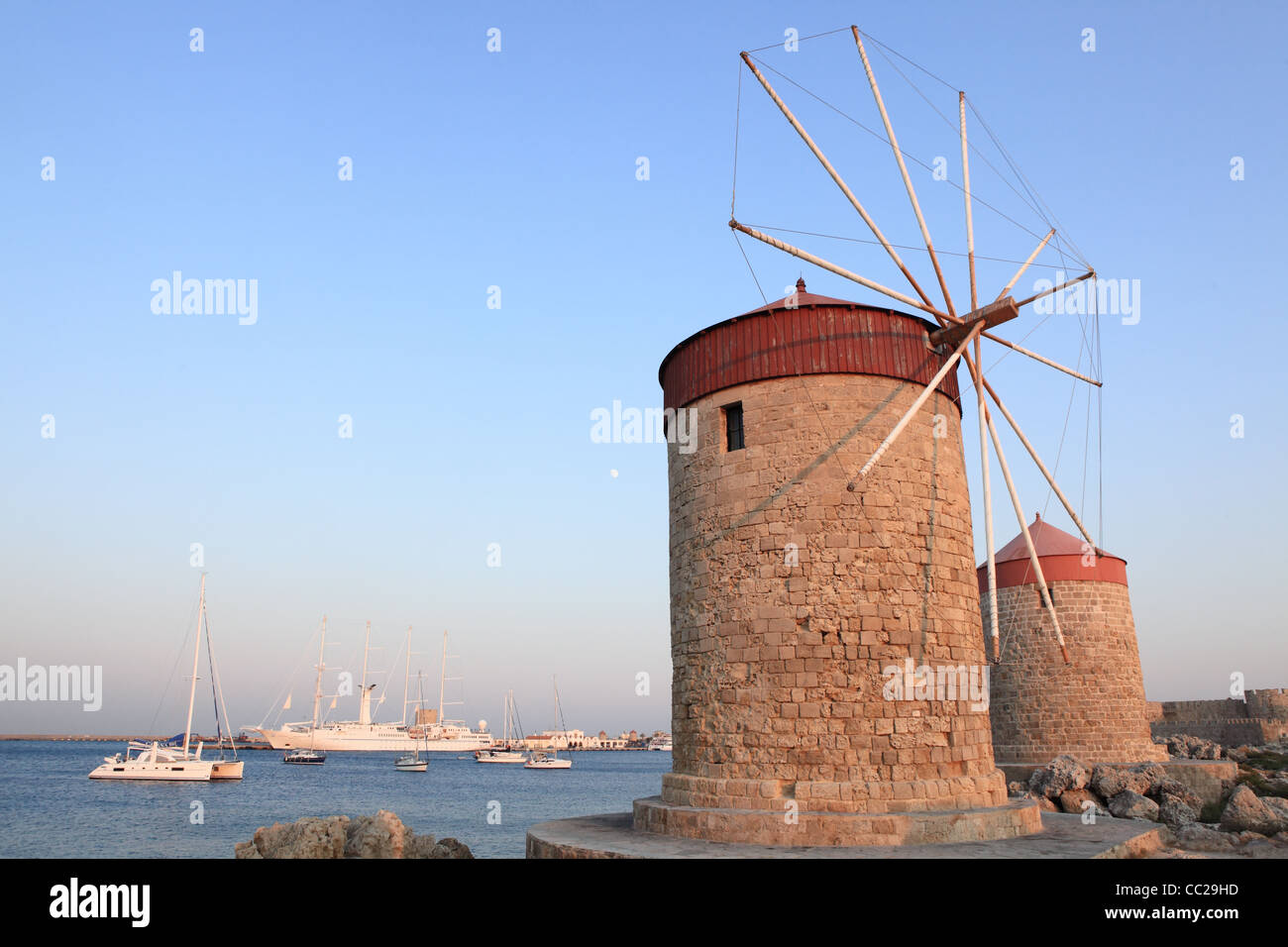 The famous windmills in the Port of Rhodes, on Rhodes island, in the ...