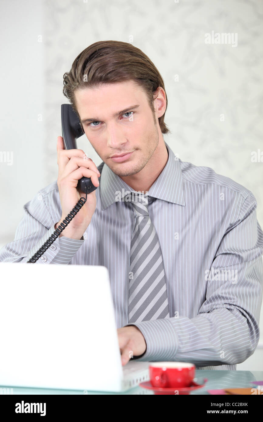 young businessman making a call Stock Photo - Alamy