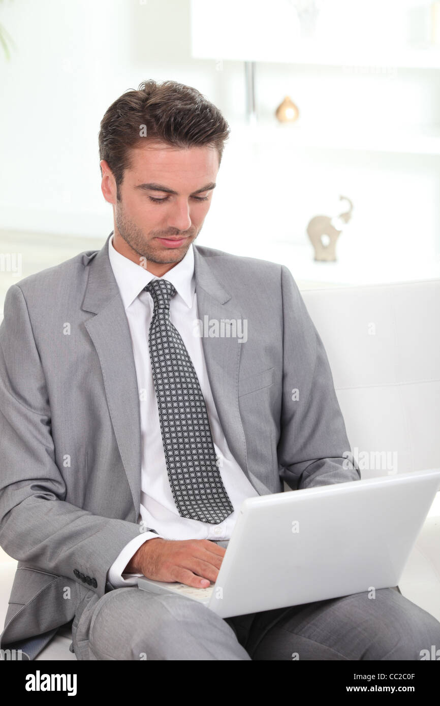Smart man browsing the Internet Stock Photo - Alamy