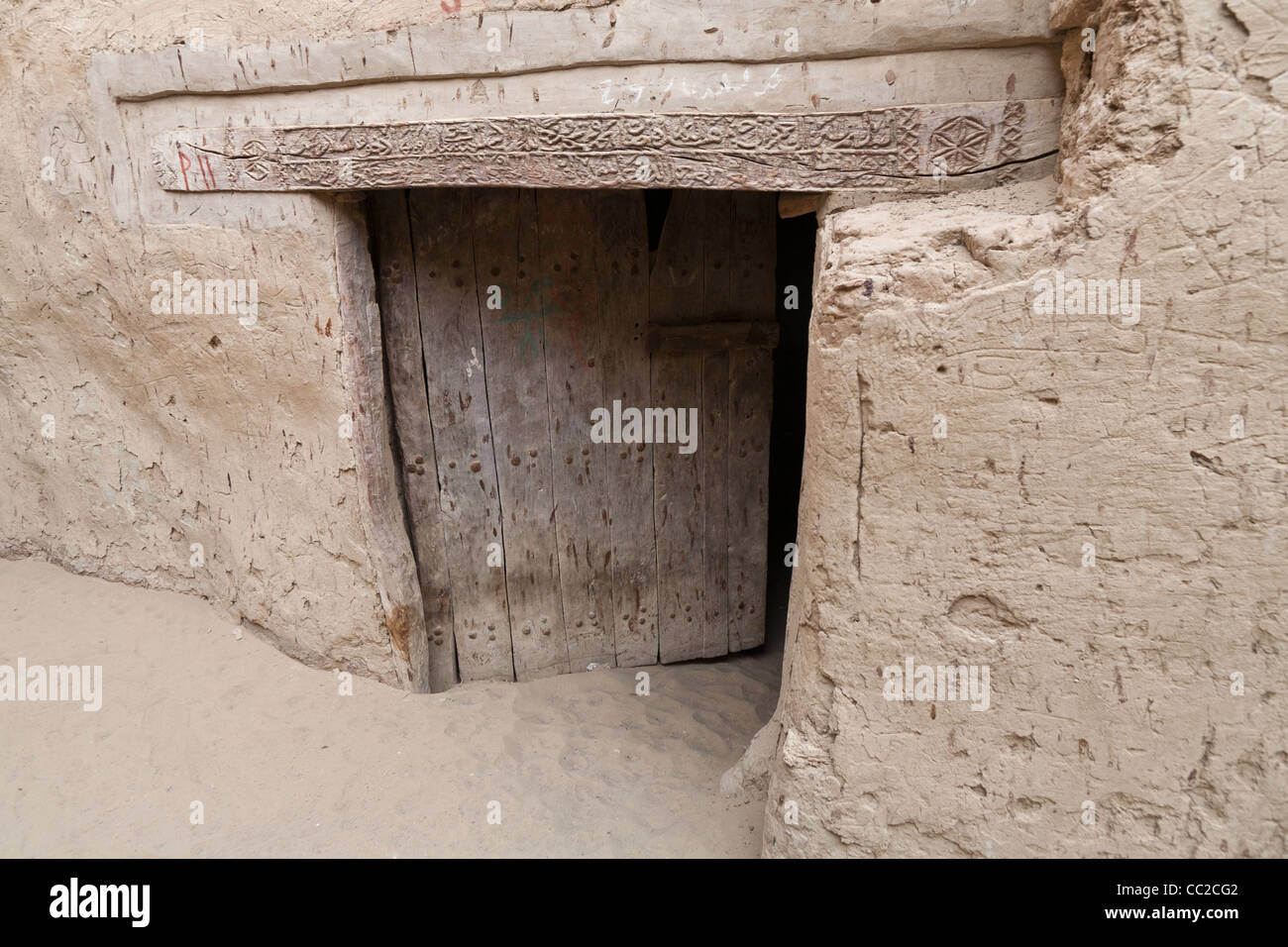 Islamic carved wooden beam at the historic village of El-Qasr at Dakhla ...