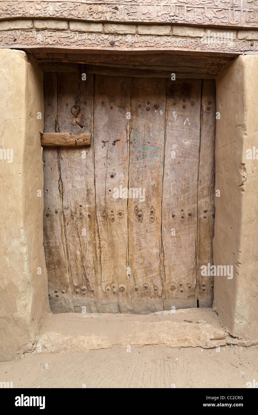 Islamic carved wooden beam at the historic village of El-Qasr at Dakhla ...