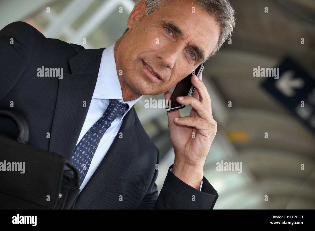 businessman in a underground station making a call Stock Photo - Alamy