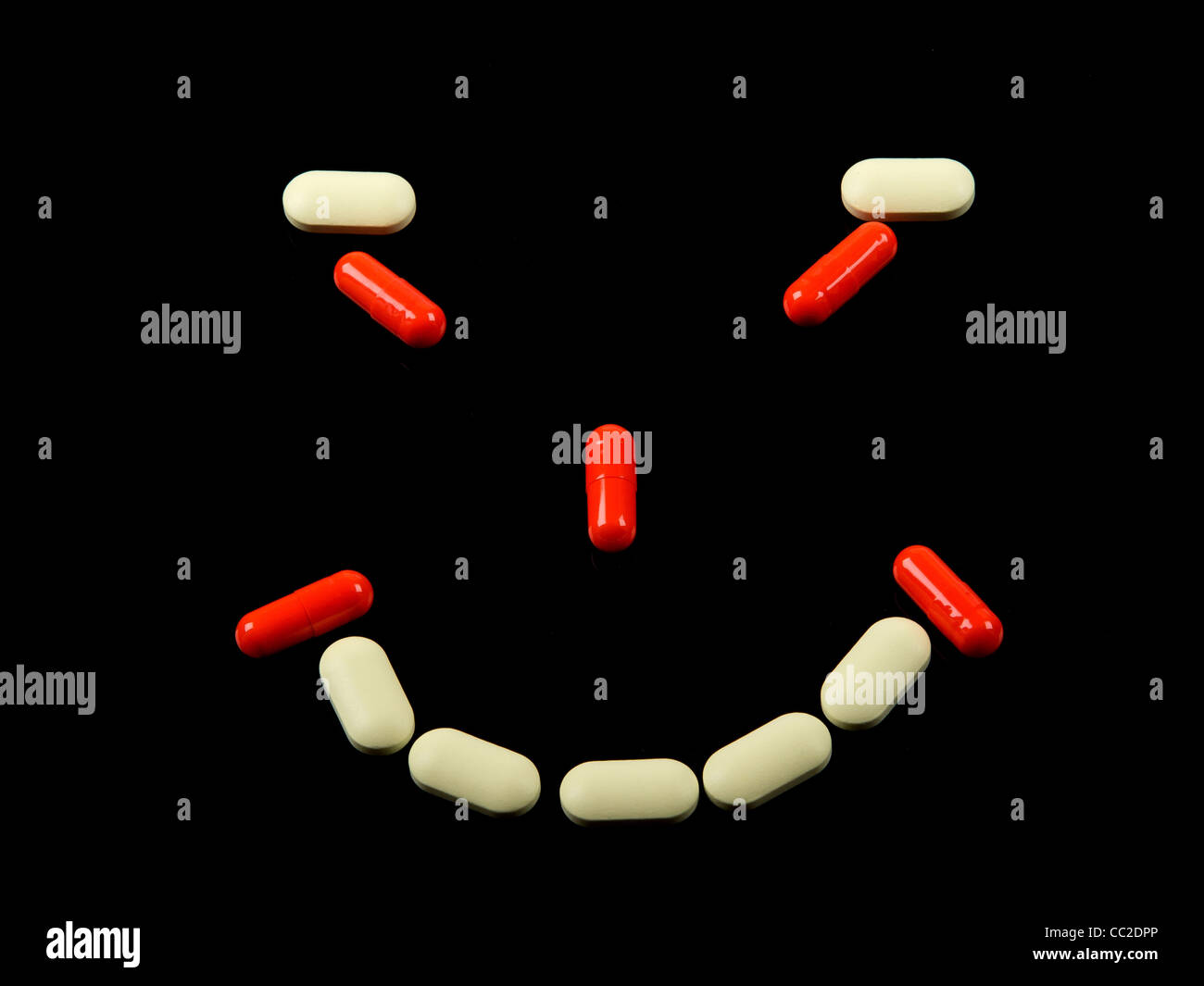 medical pills in funny face Stock Photo - Alamy