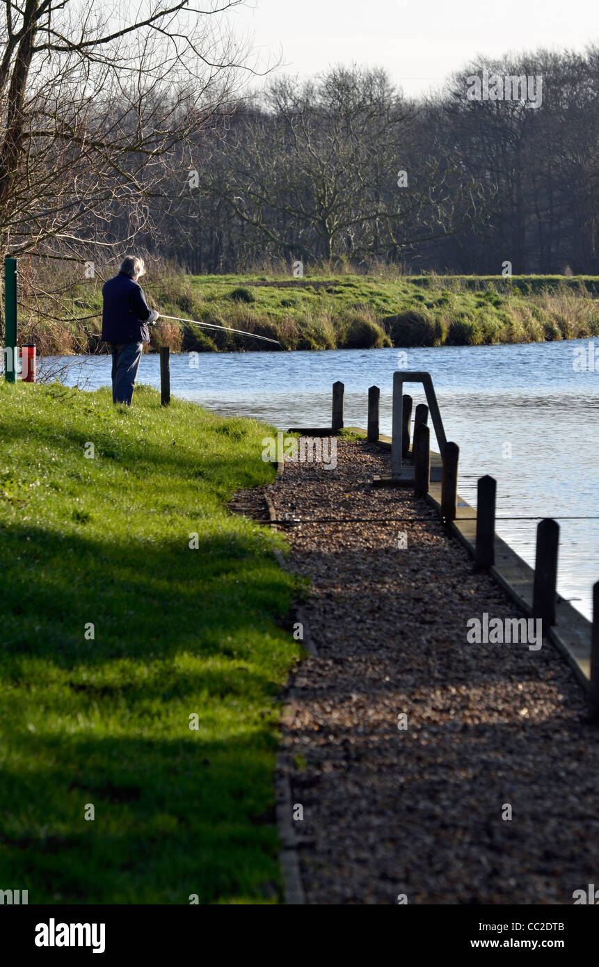 older man fishing at geldeston suffolk Stock Photo - Alamy