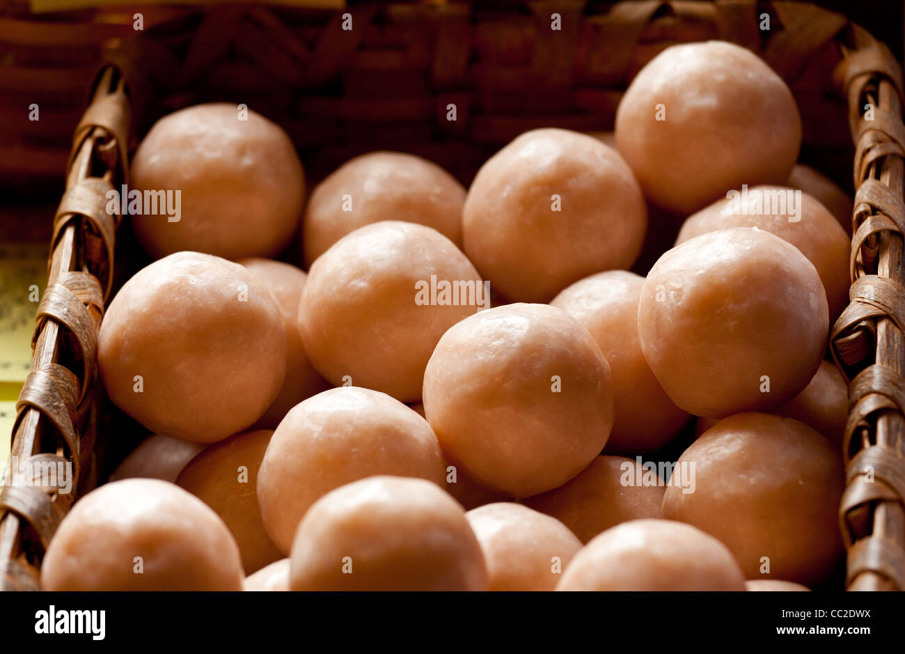 Close up of brown home made soap balls in a wicker basket Stock Photo ...