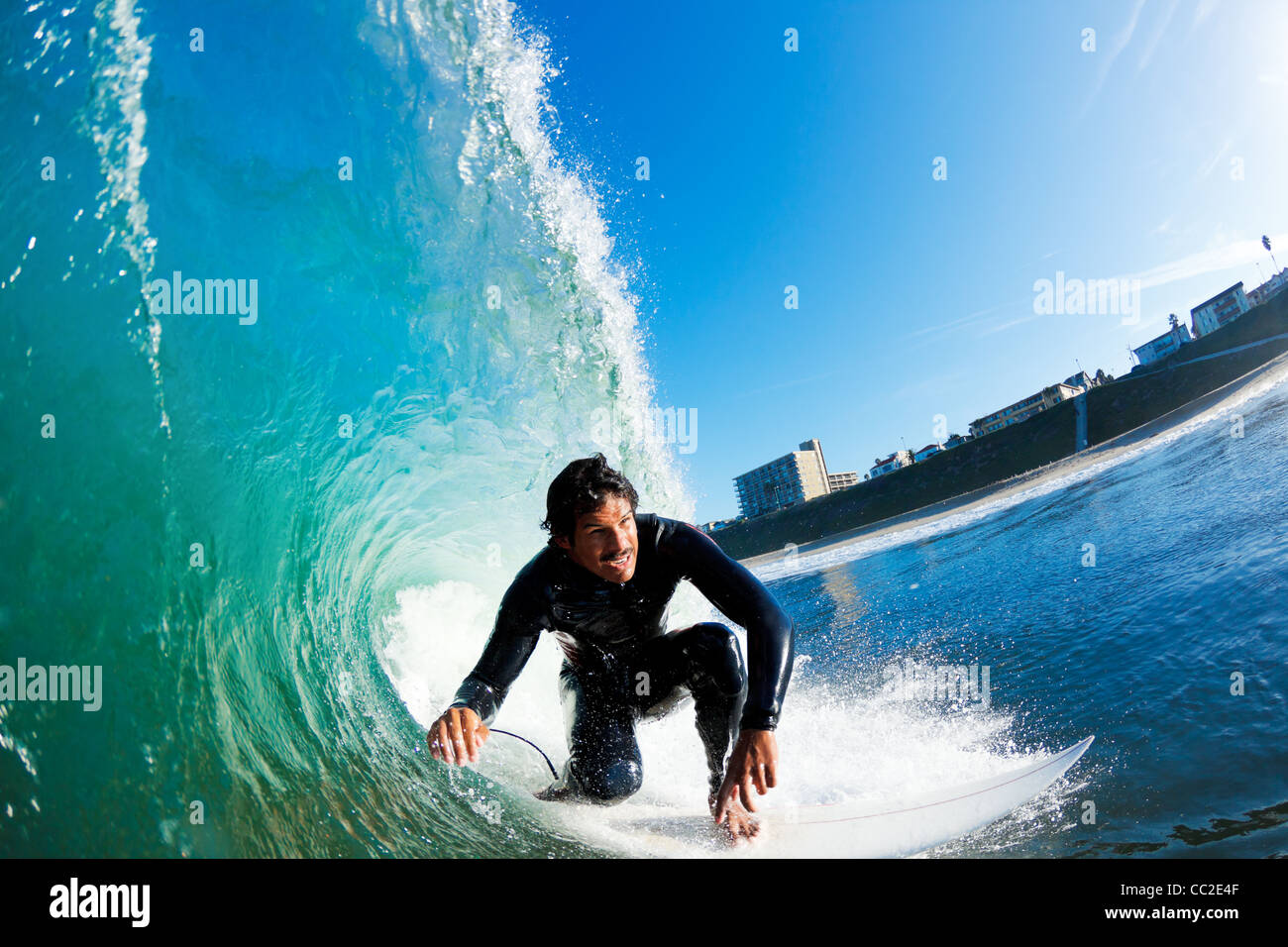 Surfer On Blue Ocean Wave Stock Photo - Alamy
