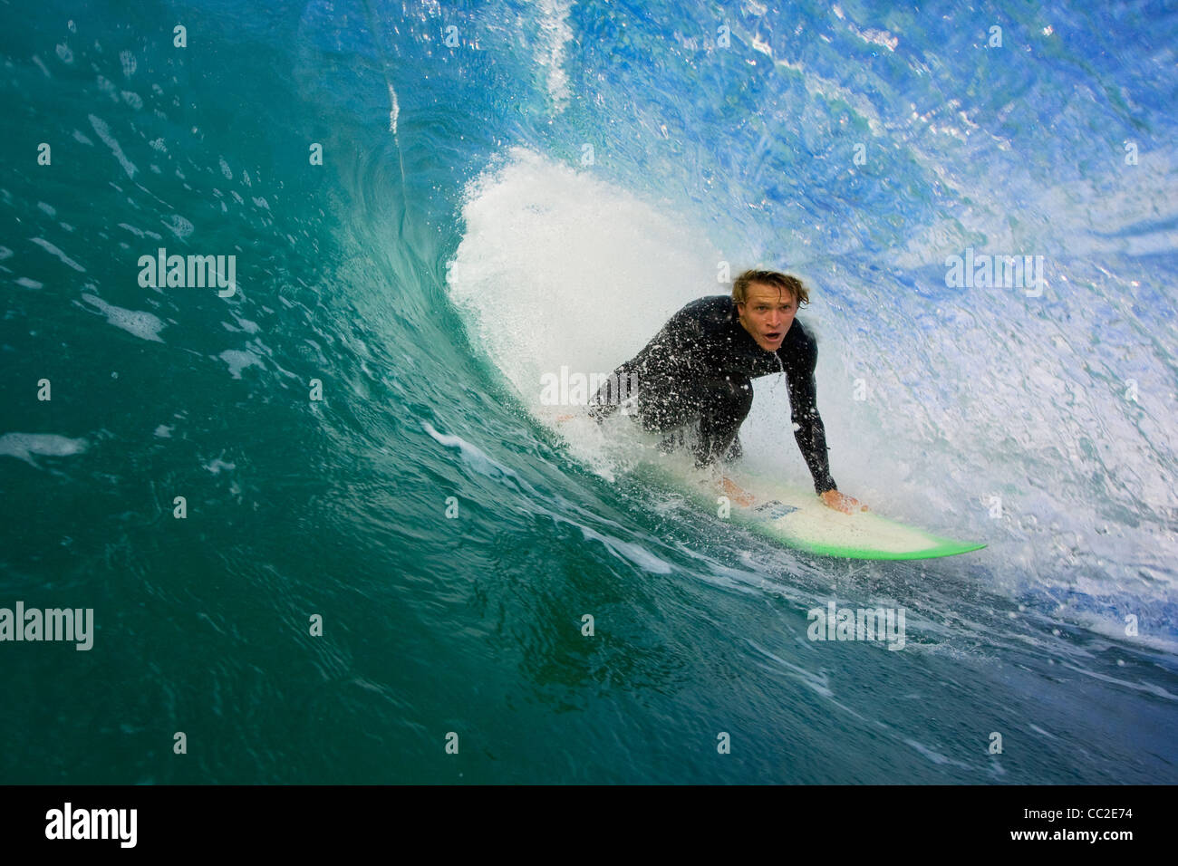 Surfer On Blue Ocean Wave Stock Photo - Alamy