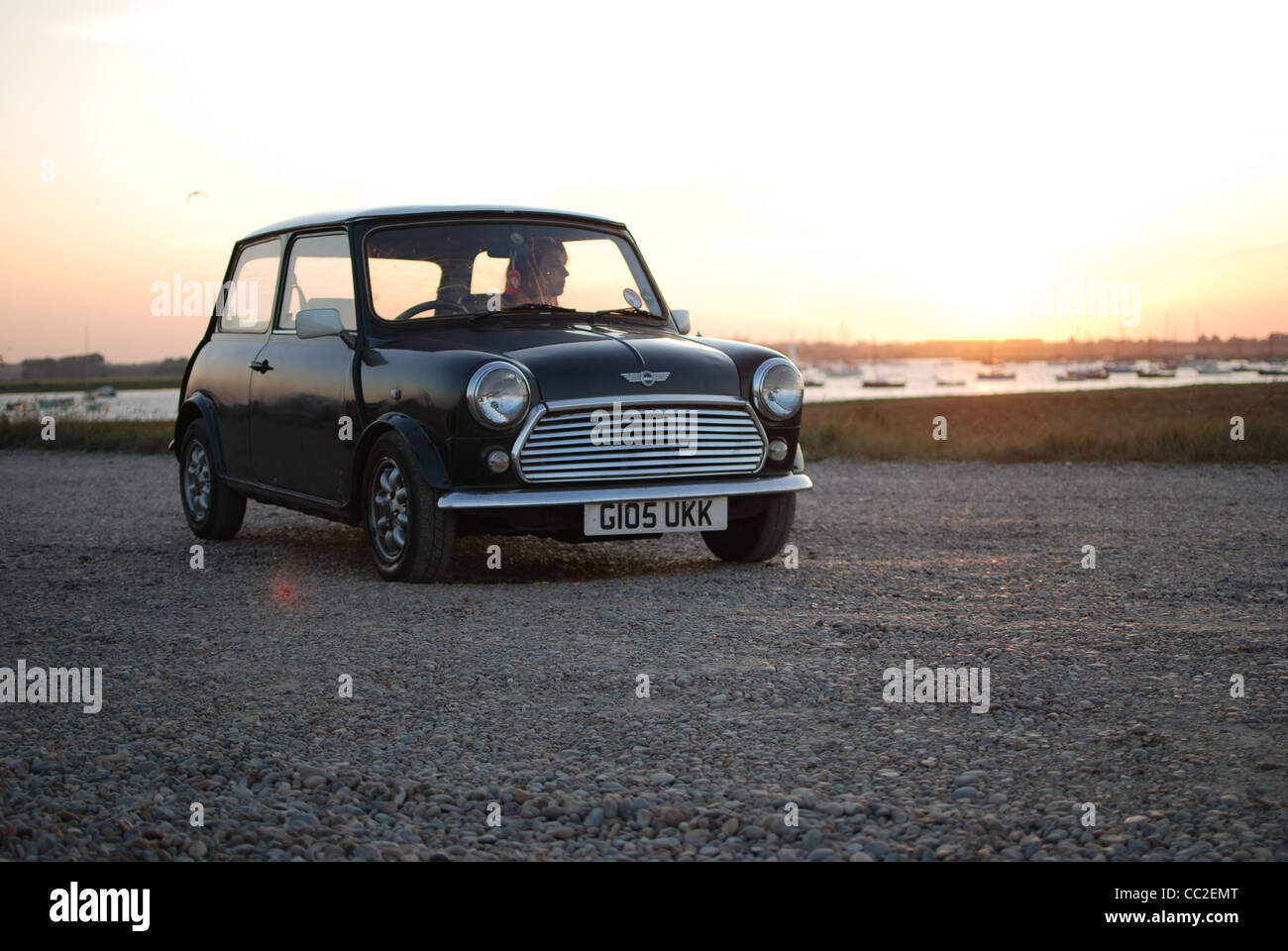 mini on gravel in front of sunset in Aldeburgh Stock Photo - Alamy