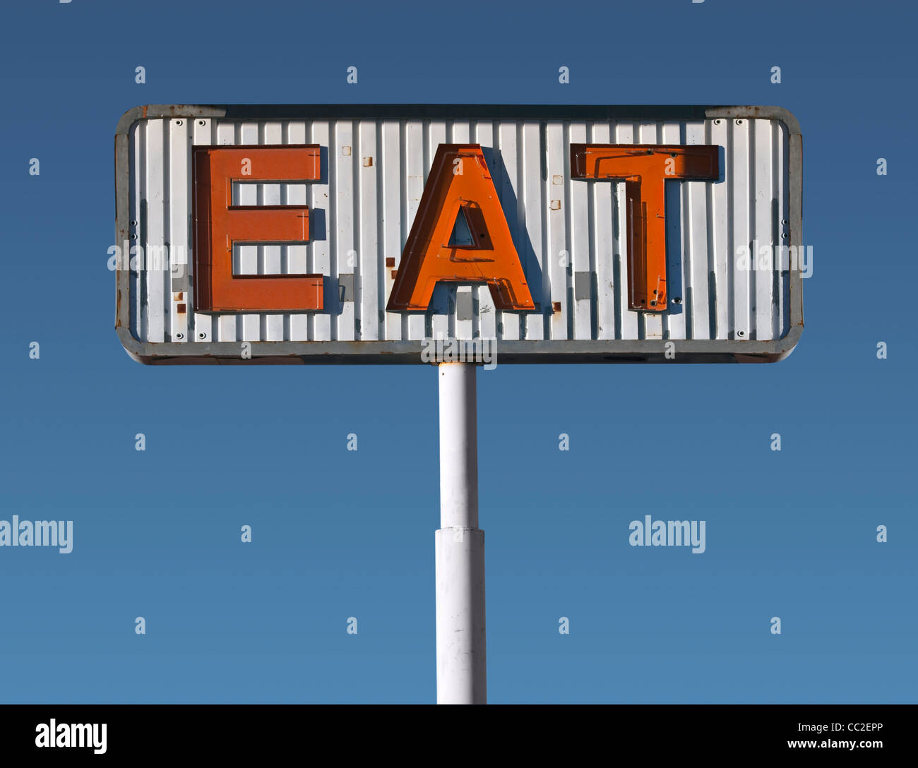 Vintage eat sign in early morning light Stock Photo - Alamy