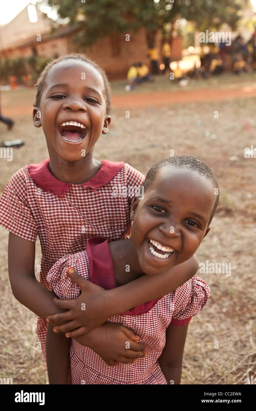 Two girls laughing classroom hi-res stock photography and images - Alamy