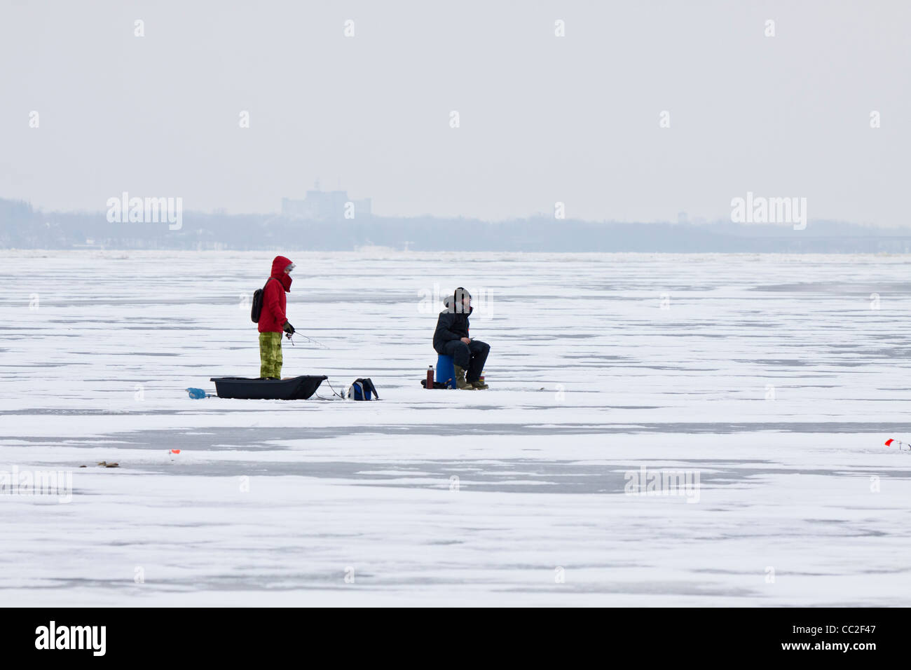 Ice fishing on the lake of Two Mountains,Oka Park, Quebec, Canada Stock ...