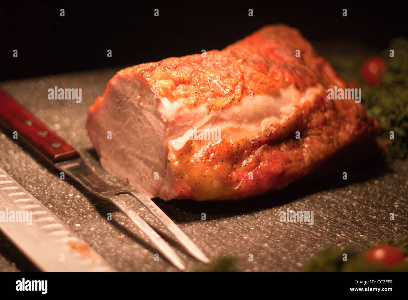 pork roast on carving station with decoration Stock Photo - Alamy