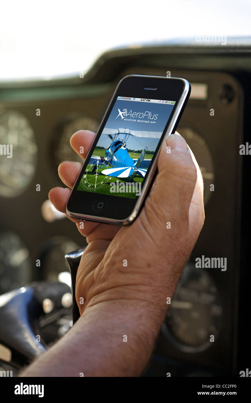 Private airplane pilot checking weather condition before flying with ...