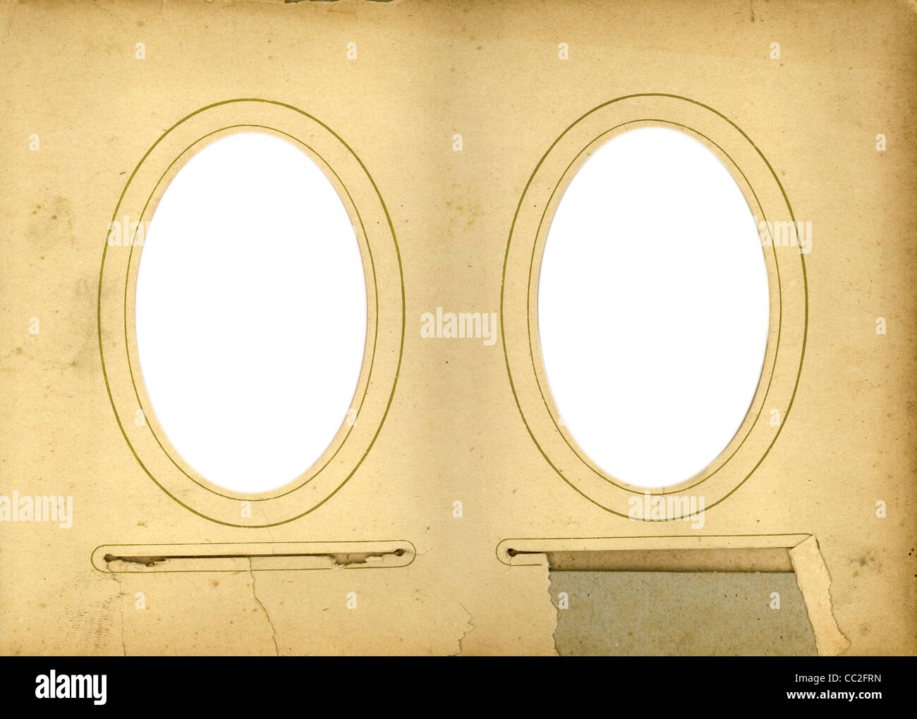 ancient photo album page background with two isolated oaval frames ...