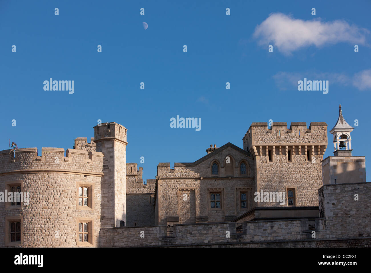 Moon in blue sky over a castle Stock Photo - Alamy