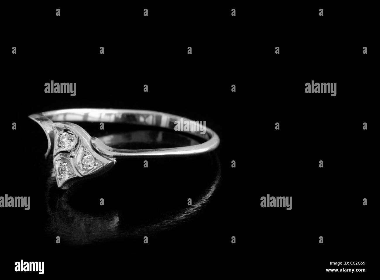 Diamond ring on black Black and White Stock Photos & Images - Alamy