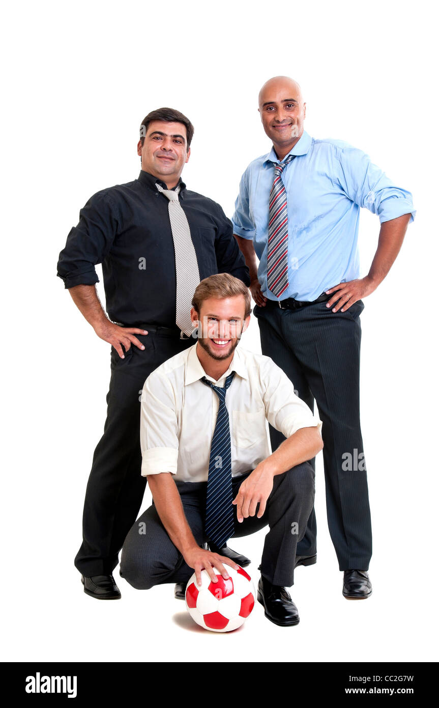Team of businessmen with soccer ball Stock Photo - Alamy