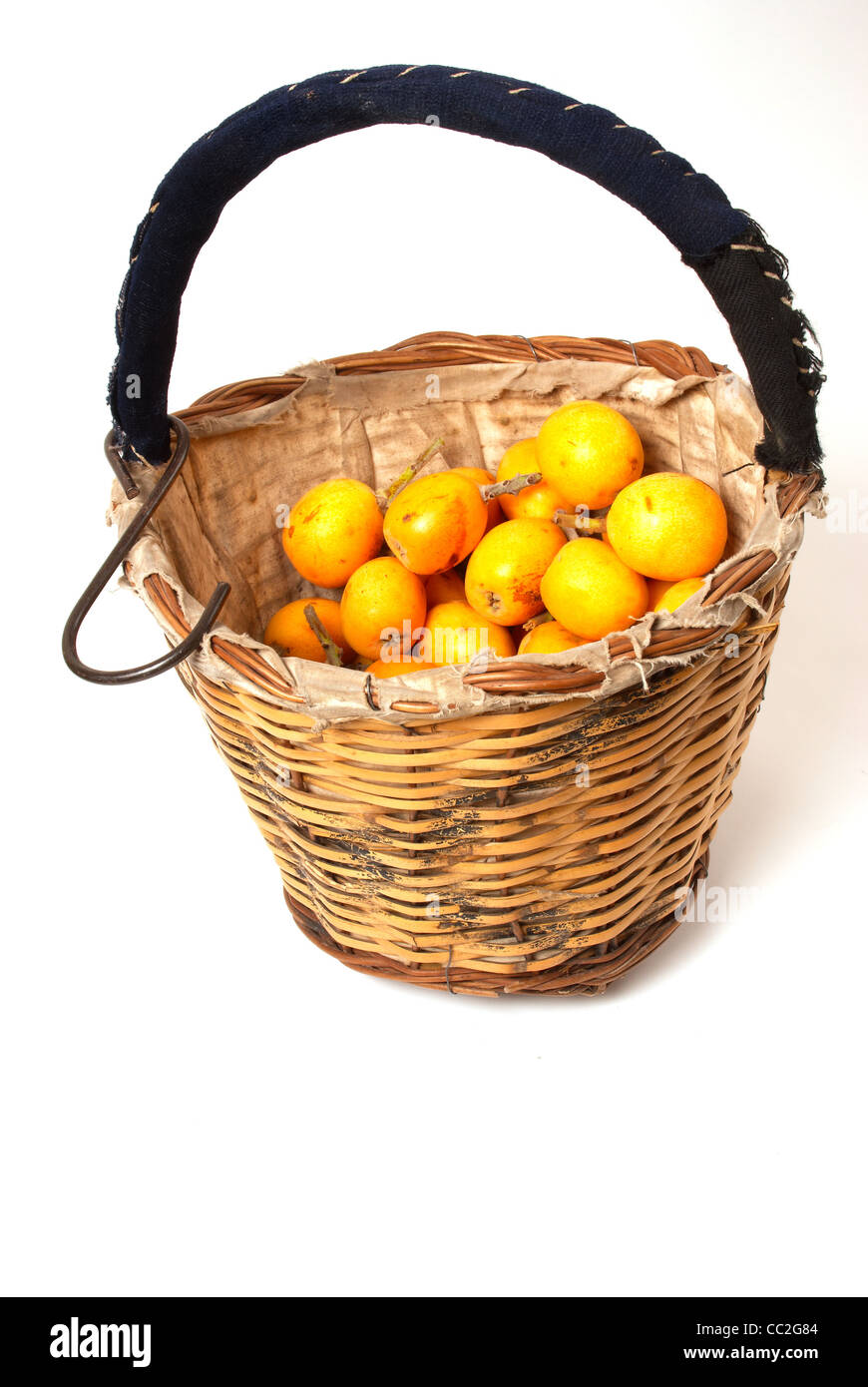 Traditional crop basked with freshly picked loquats Stock Photo - Alamy