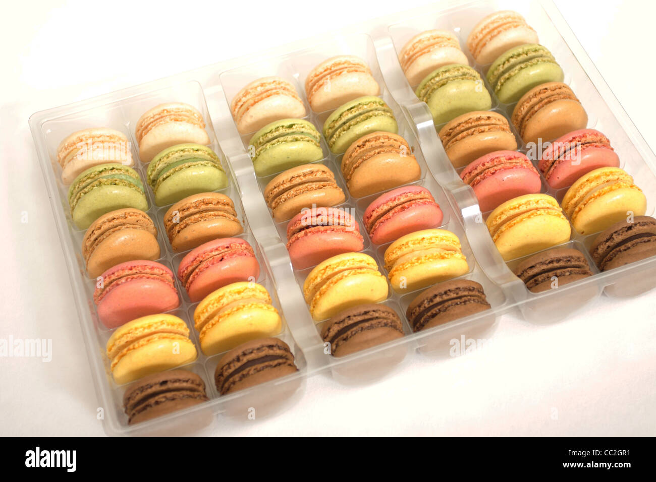 assortment of macaroons on a white background Stock Photo - Alamy