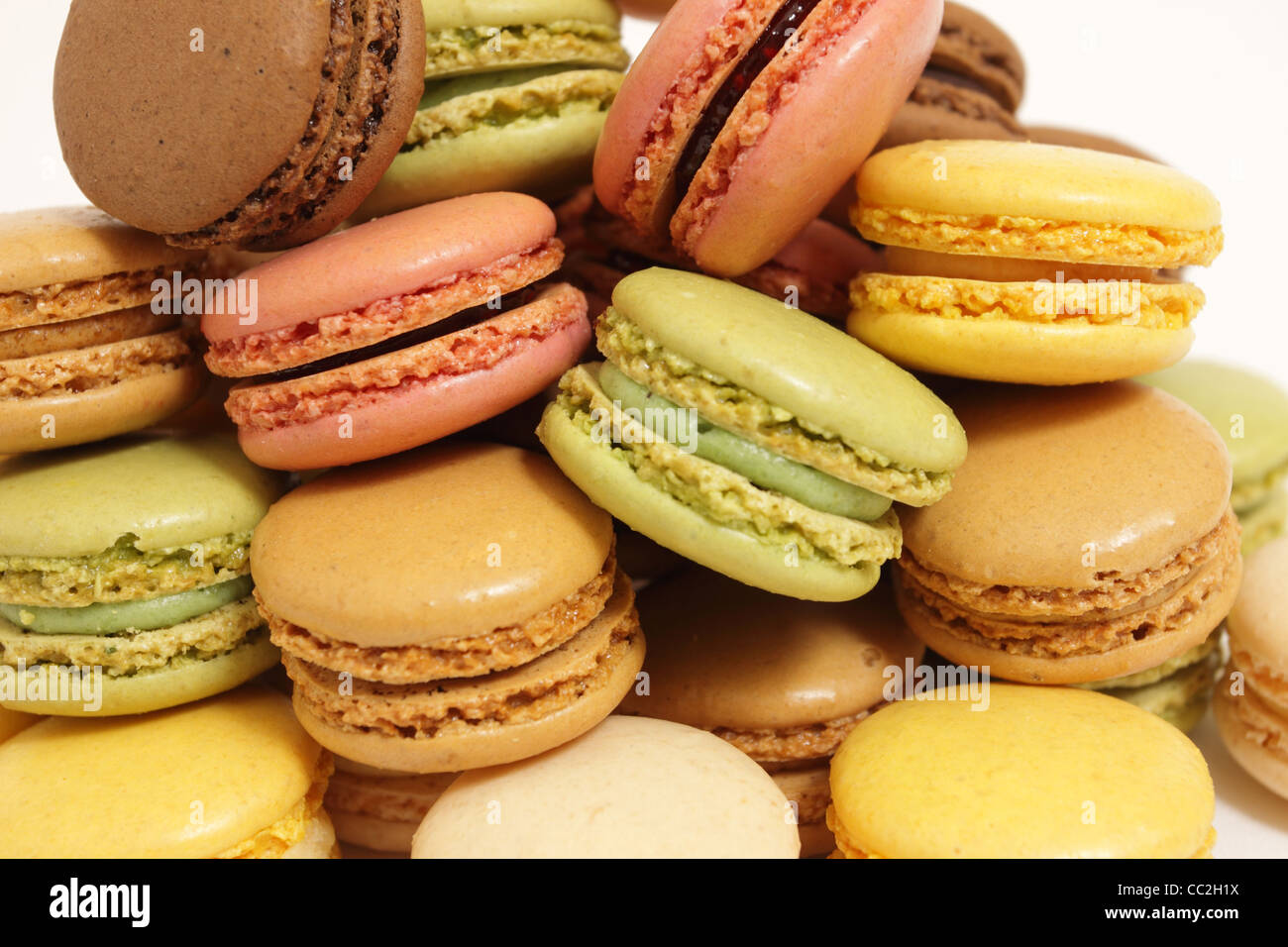 assortment of macaroons on a white background Stock Photo - Alamy